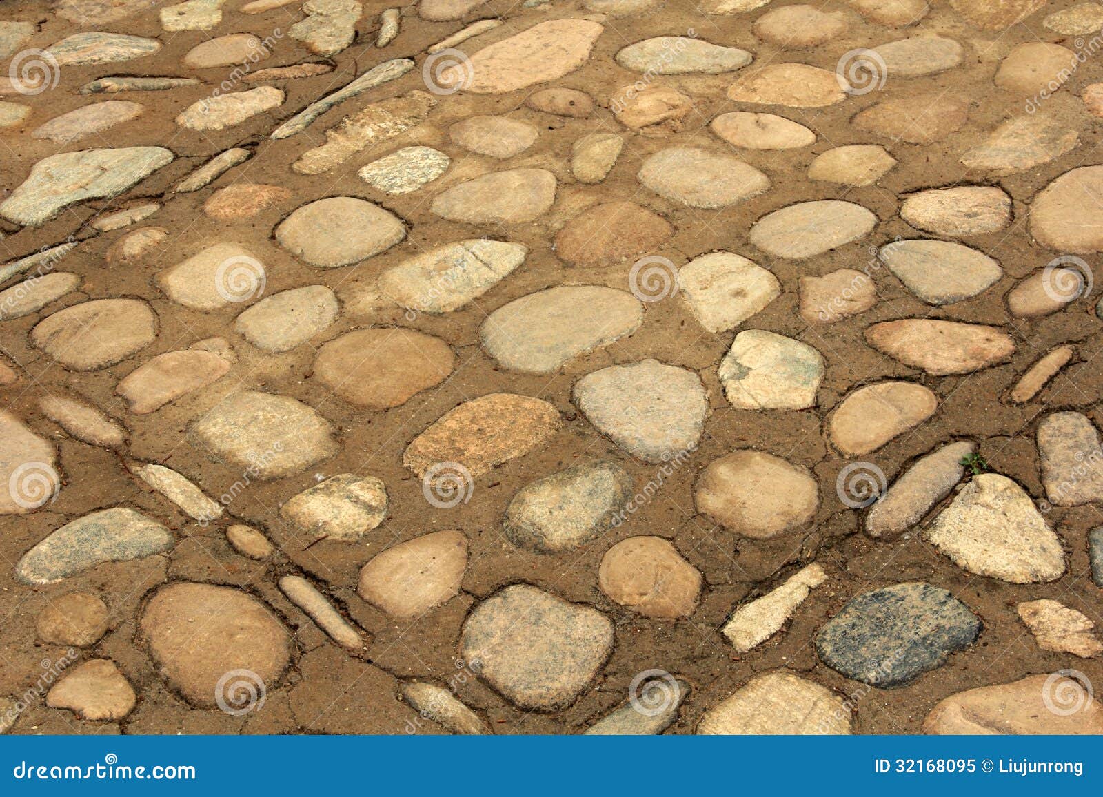 Cobblestone paved ground stock image. Image of construction - 32168095
