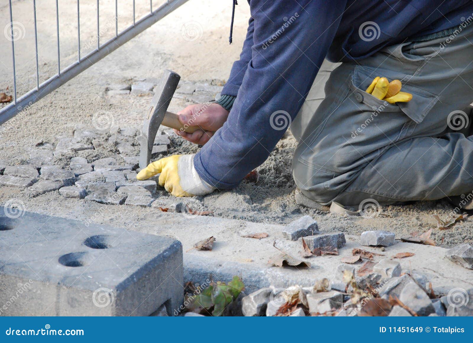 Cobblestone paver stock image. Image of worker, construction - 11451649