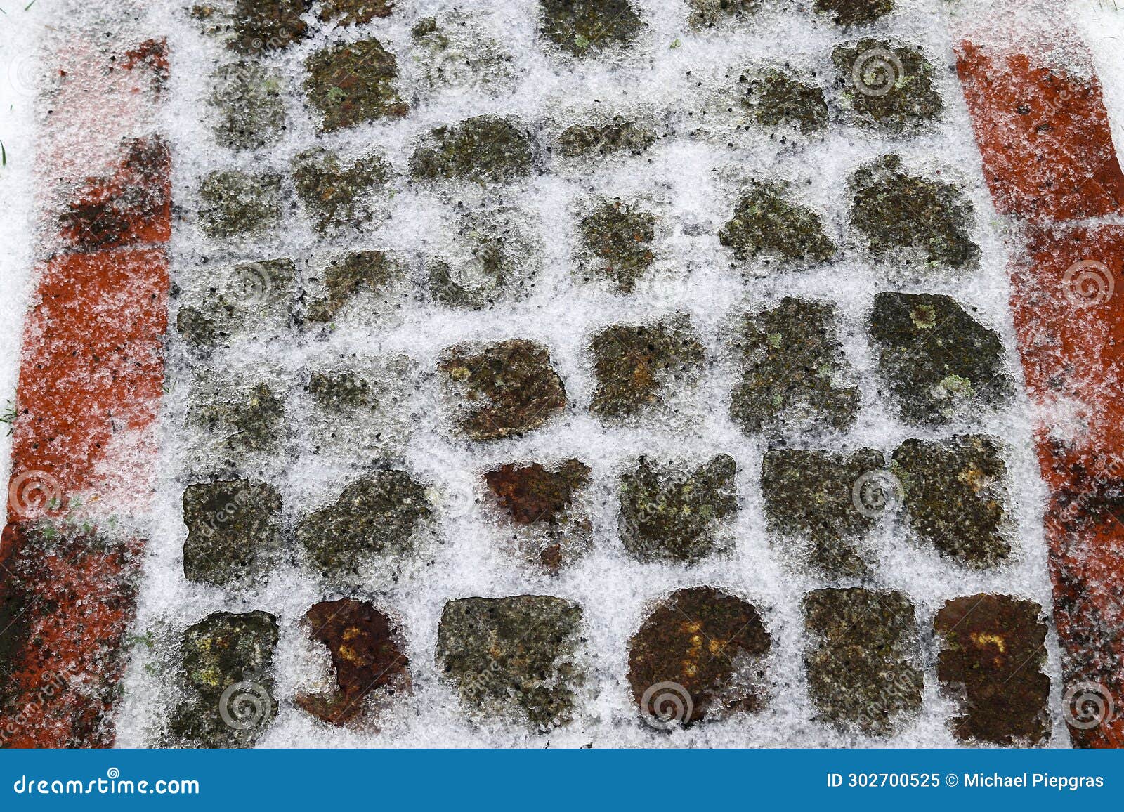 A Cobblestone Surface with Snow and Ice Stock Image - Image of sidewalk ...