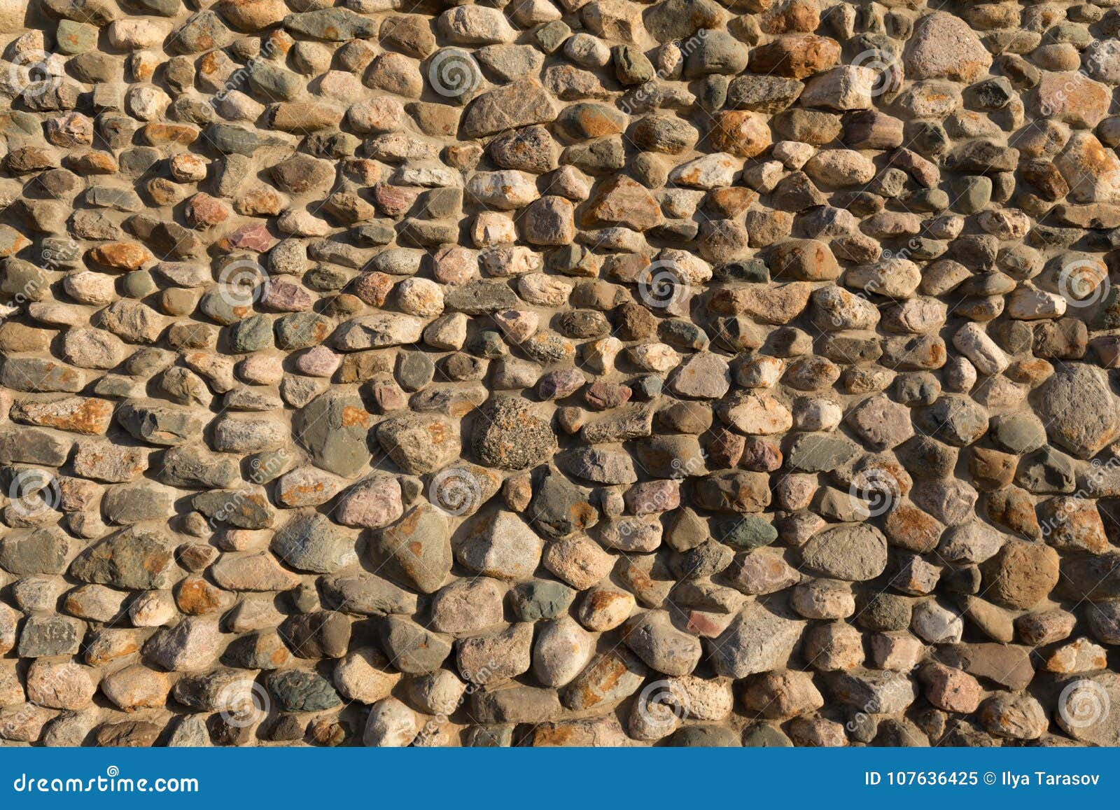 Cobblestone wall texture. stock image. Image of background - 107636425