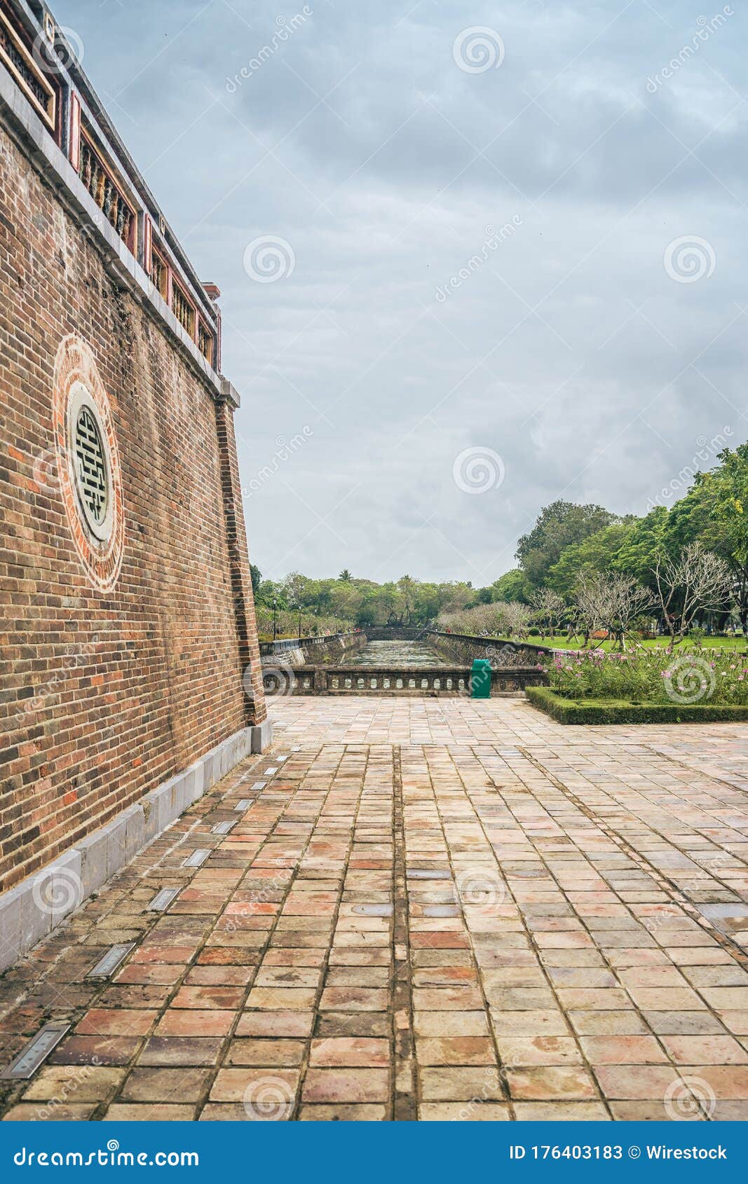 Cobblestone Yard Around a Historic Structure with Brick Walls in ...