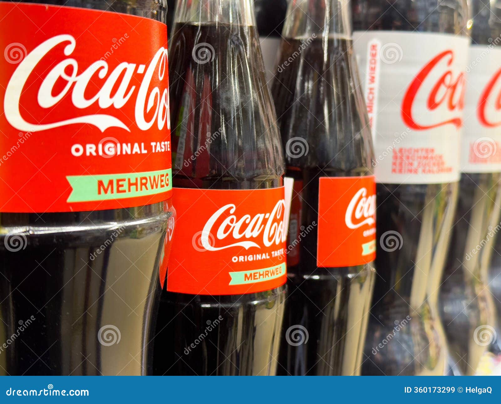 Coca-cola Bottles With Red Labels Displayed In A Row Editorial Photo ...