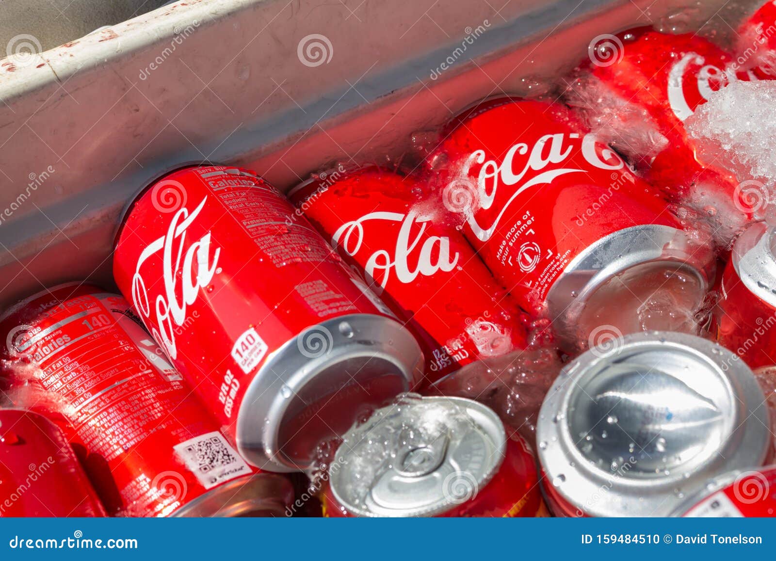Coca Cola cans in cooler editorial image. Image of lime - 159484510