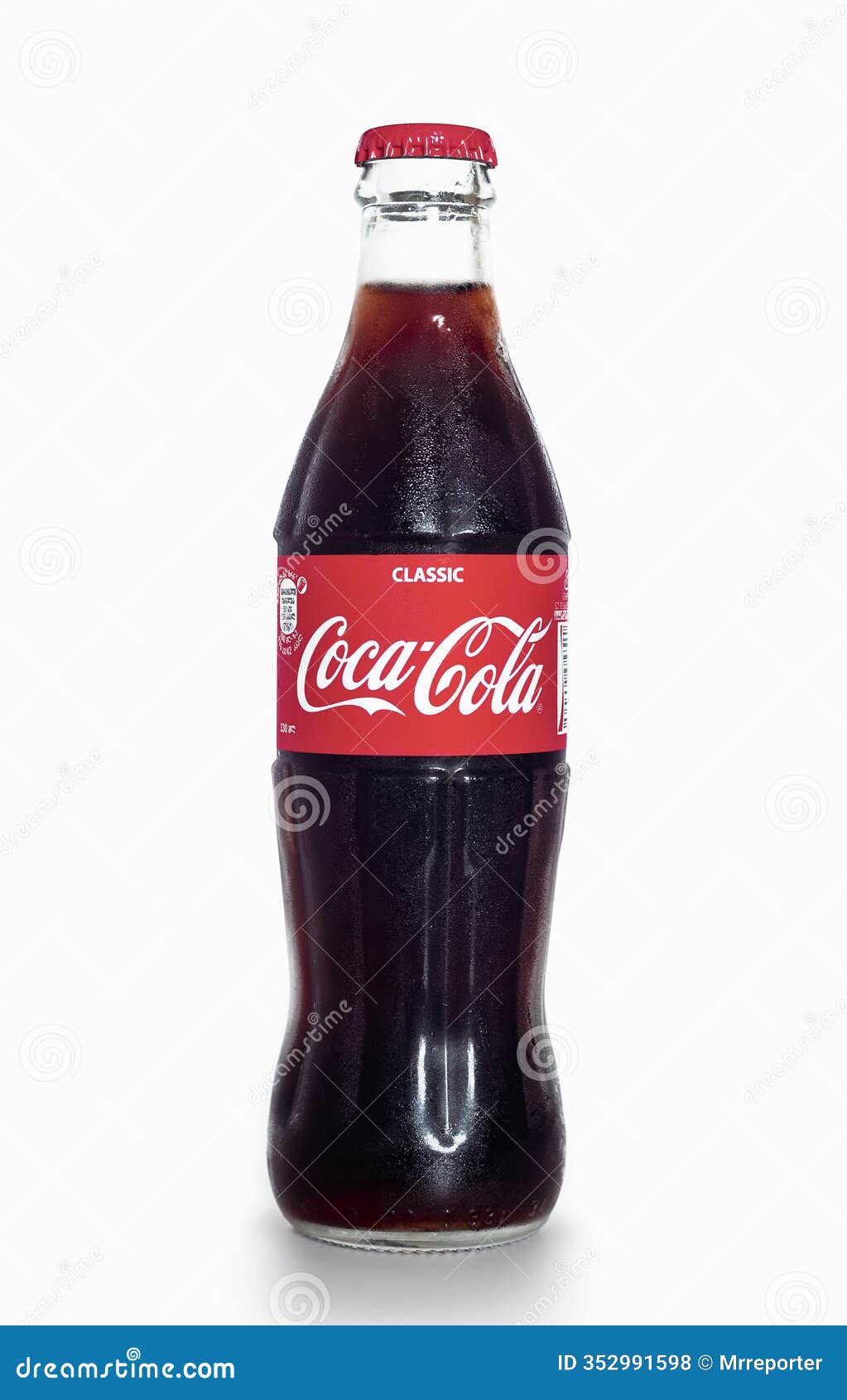Coca-Cola Classic in Wet Glassy Bottle Standing on White Editorial ...