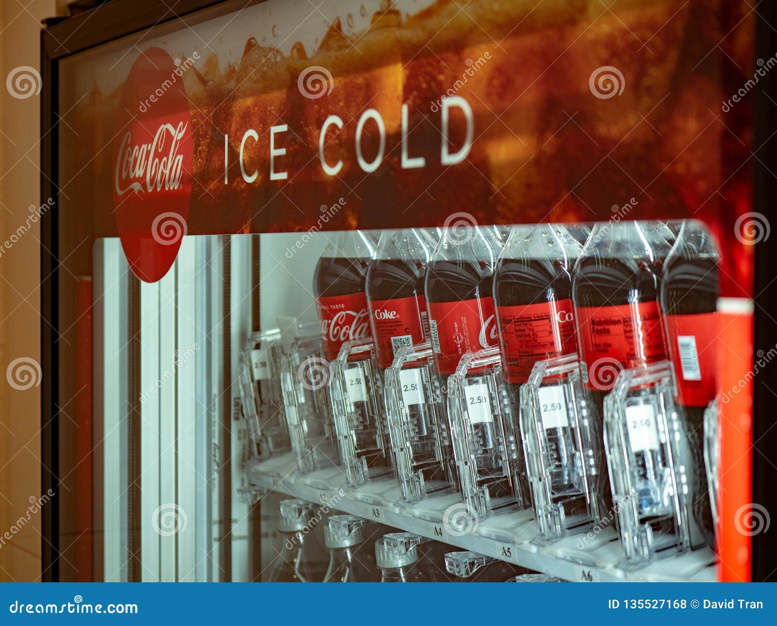Coca Cola Ice Cold Logo Filled with Bottles Inside a Vending Machine ...