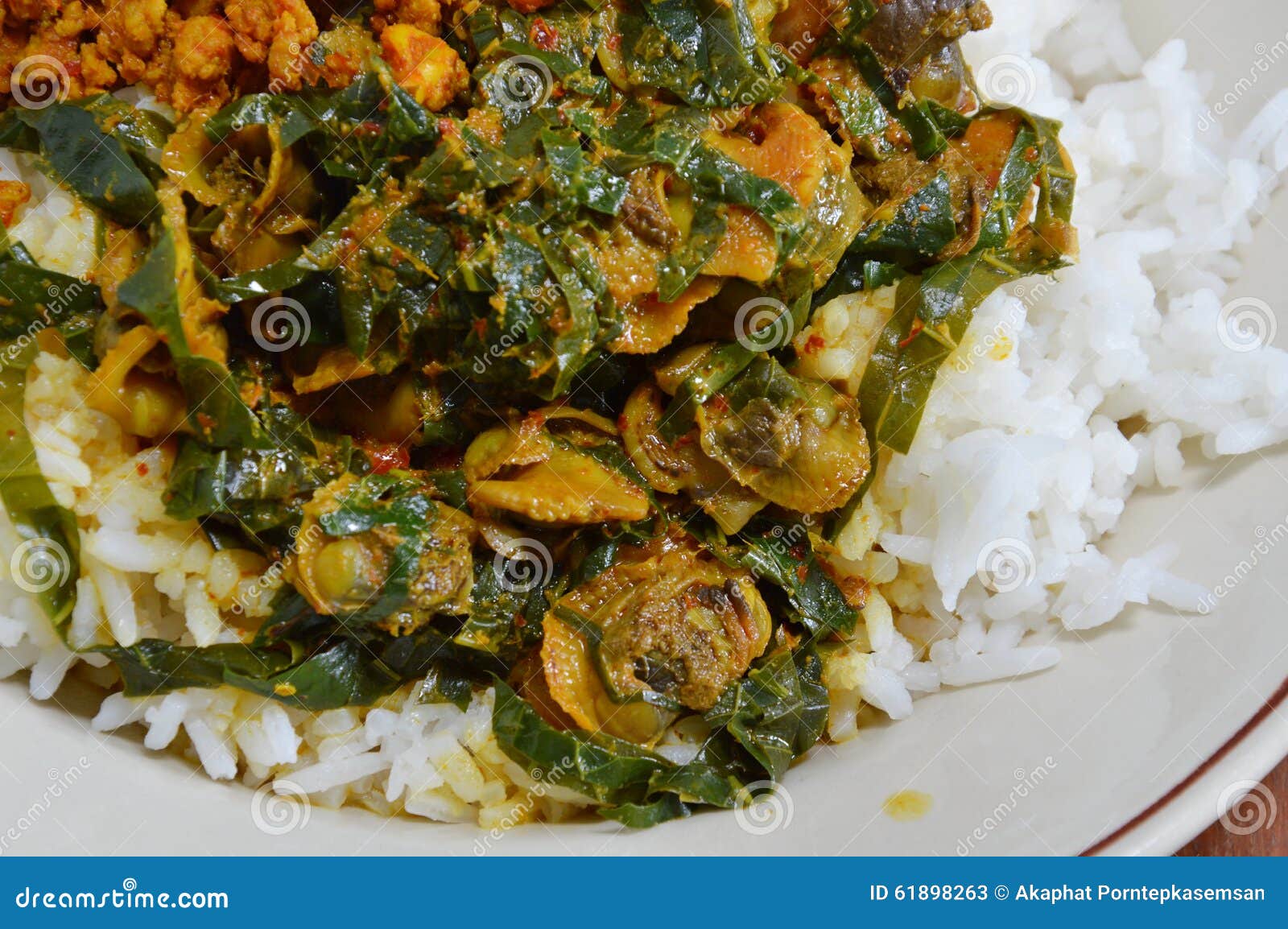 Cockle Curry with Betel Leaves on Rice Stock Image - Image of milk ...