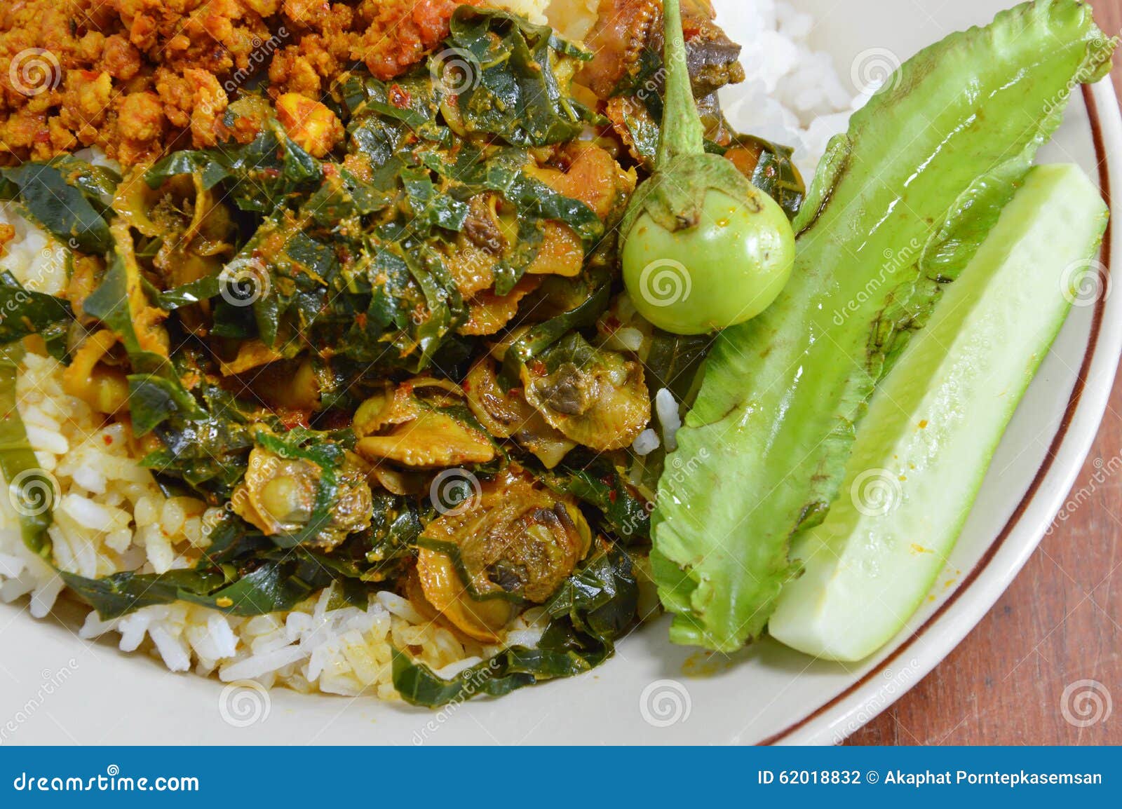 Cockle Curry with Betel Leaves and Vegetable on Rice Stock Photo ...