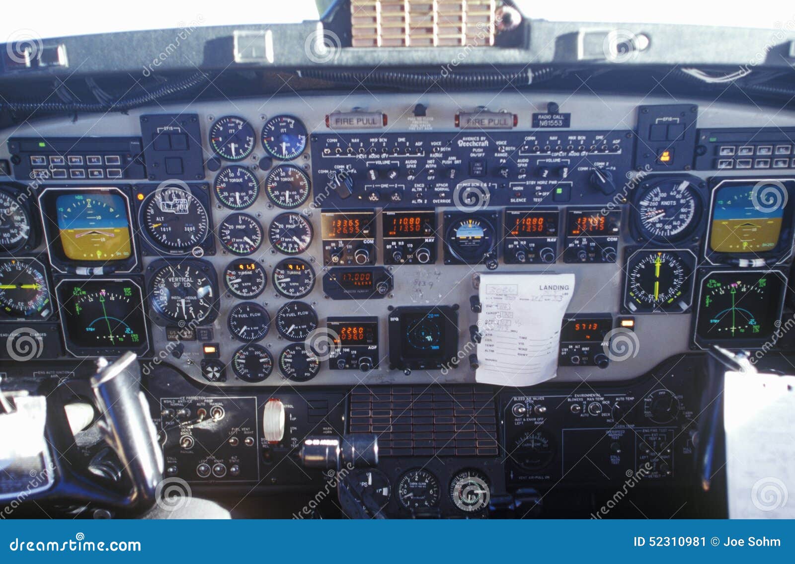 The Cockpit and the Pilots in a Commuter Airplane Editorial Photo ...