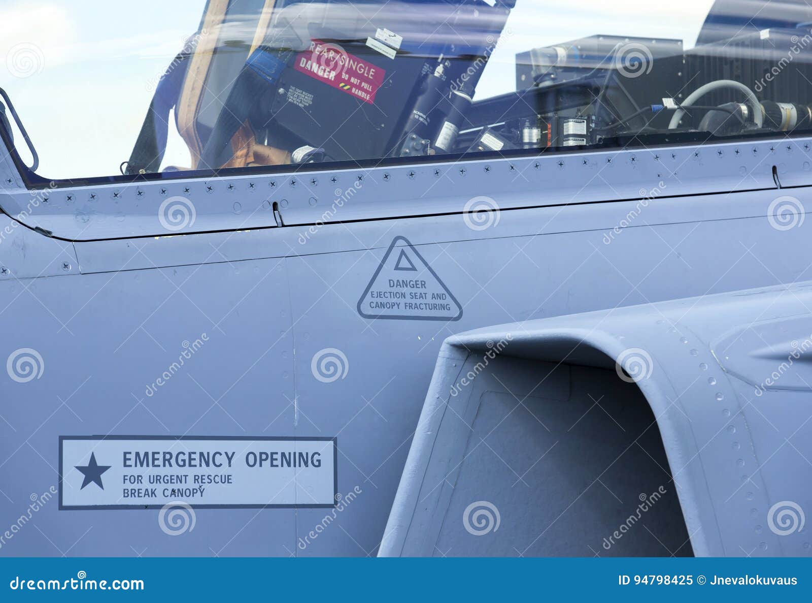 Red Ejector Seat Warning Sign On Jet Fighter Aeroplane Fuselage. Danger ...
