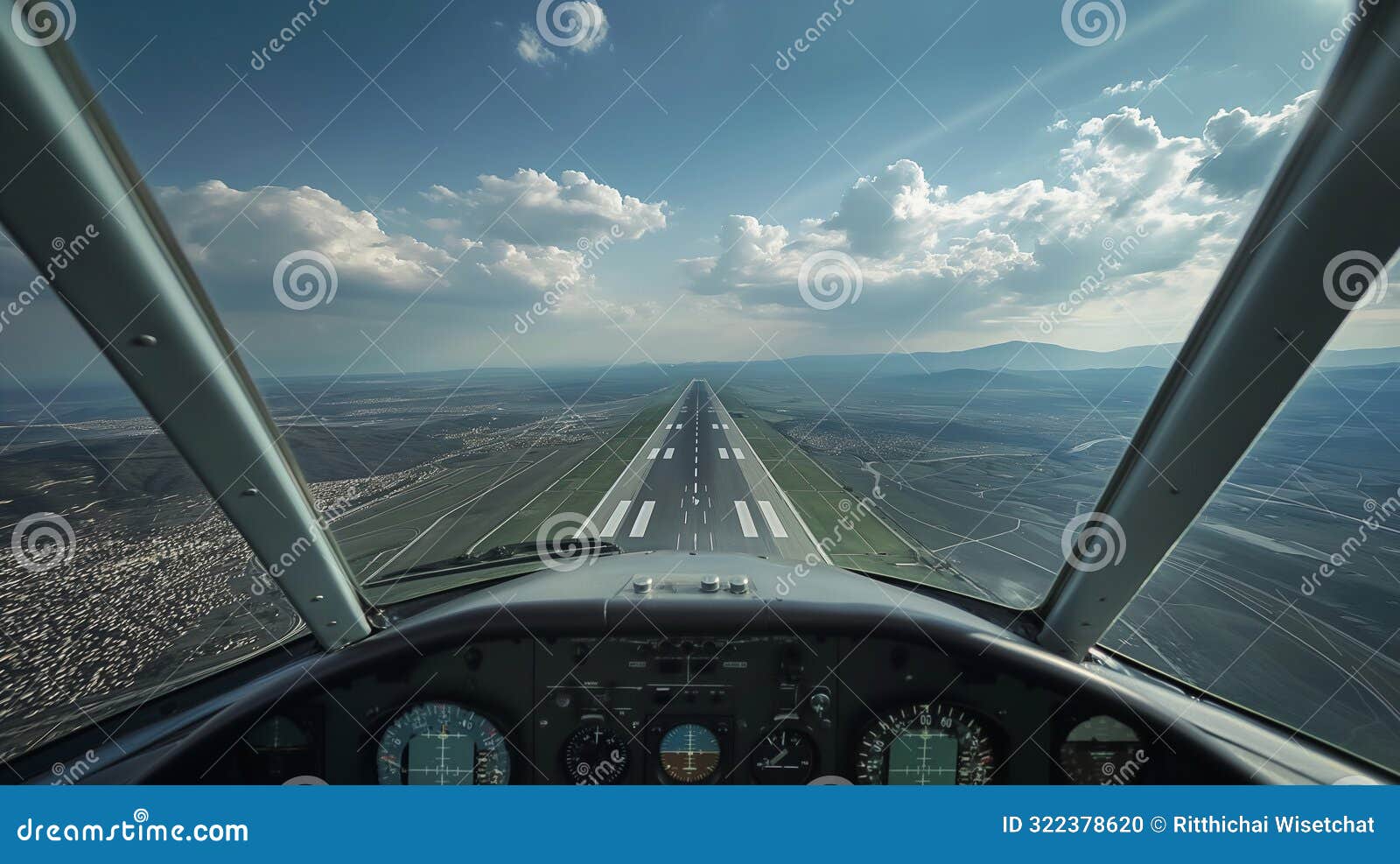 Cockpit View of an Airplane Approaching a Runway, with a Clear Sky and ...