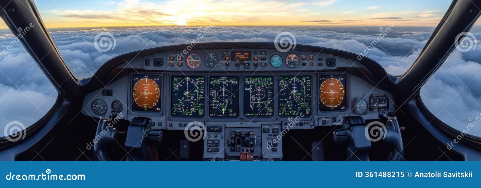 Cockpit View of a Jet Approaching Sunset Over Clouds while Flying at ...
