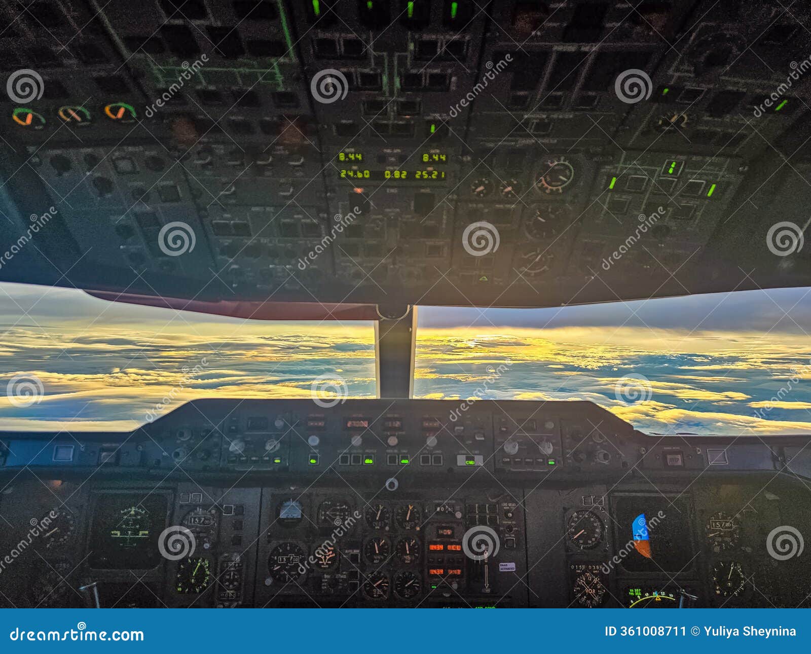 Cockpit View Overlooking Clouds at Sunset, an Aviation Dream in ...