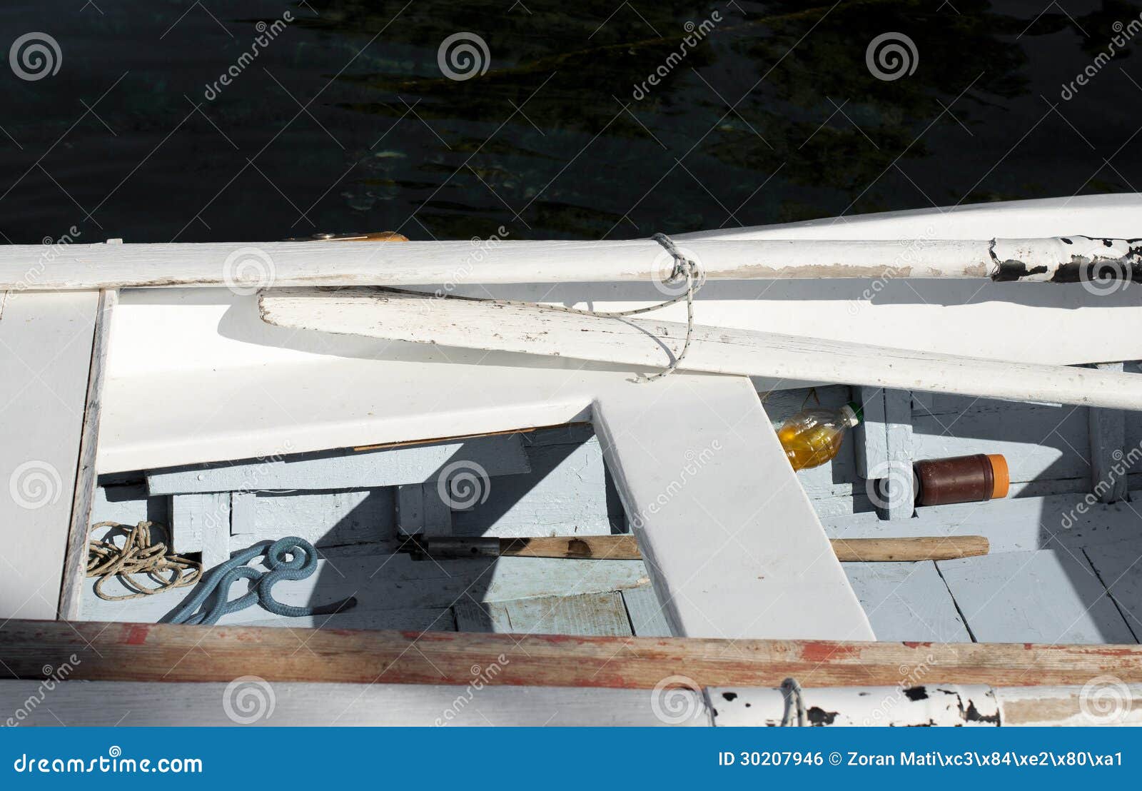 Wooden Boat with Broken Paddle Stock Photo - Image of rowing, closeup ...