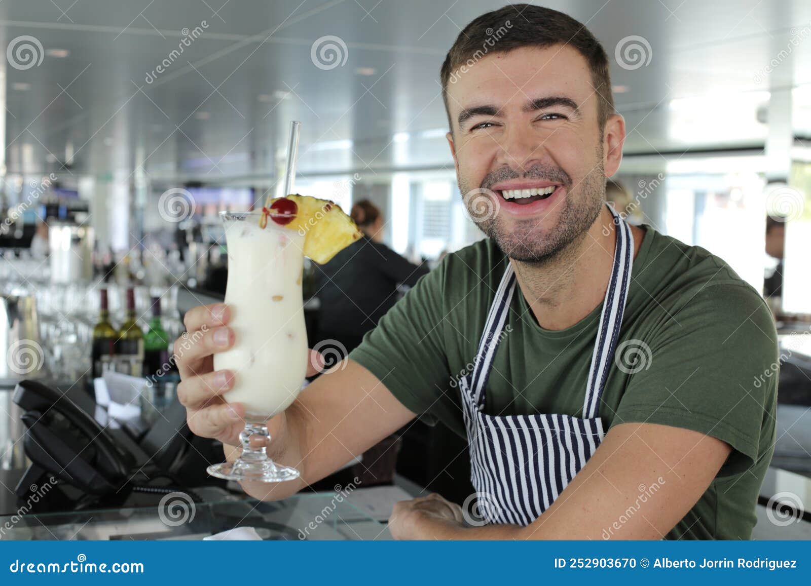 Cocktail Bar Worker Serving a Pina Colada Stock Photo - Image of ...