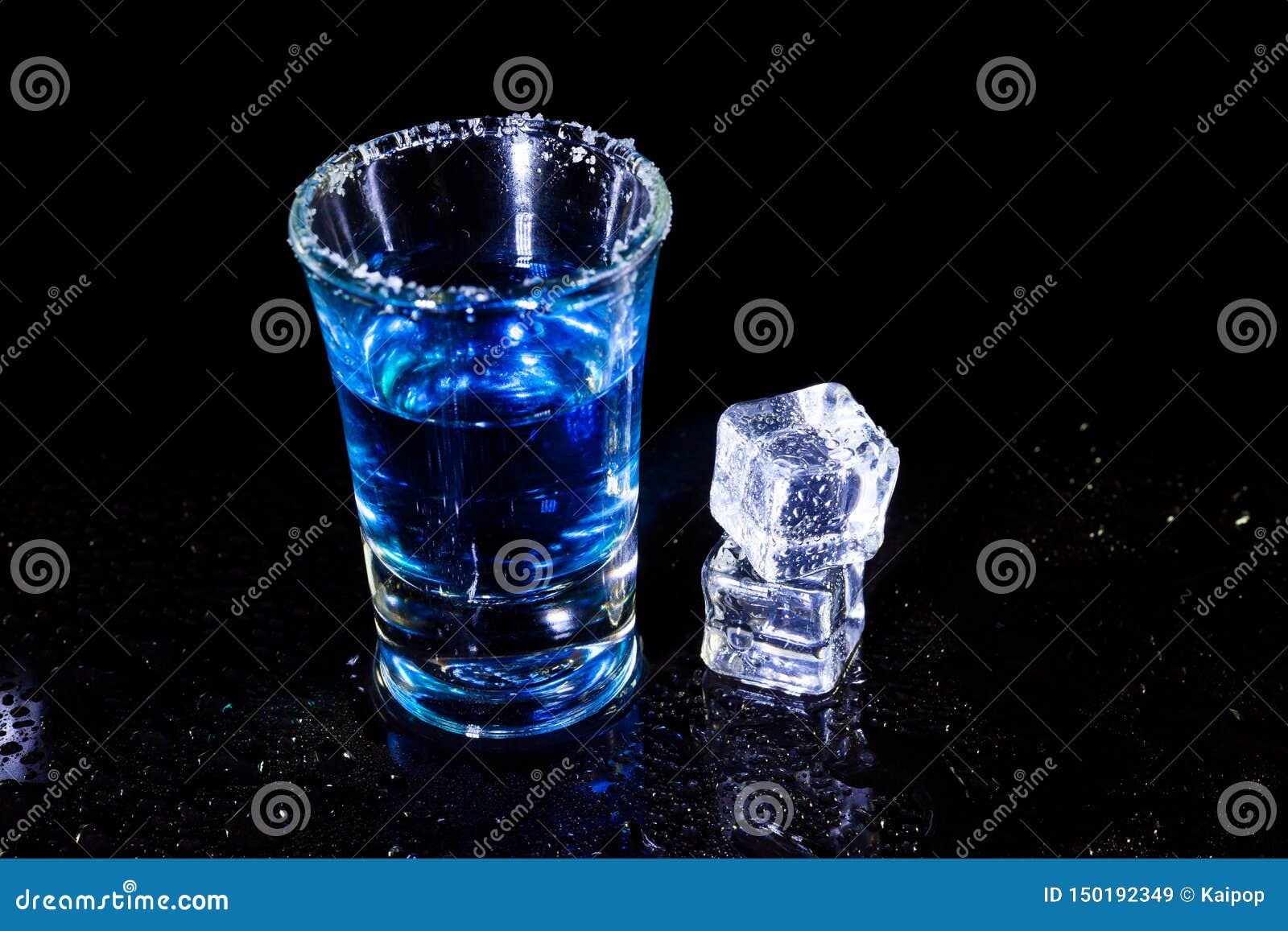 Cocktail Blue Shots with Ice Cubes on Black Background Stock Image ...