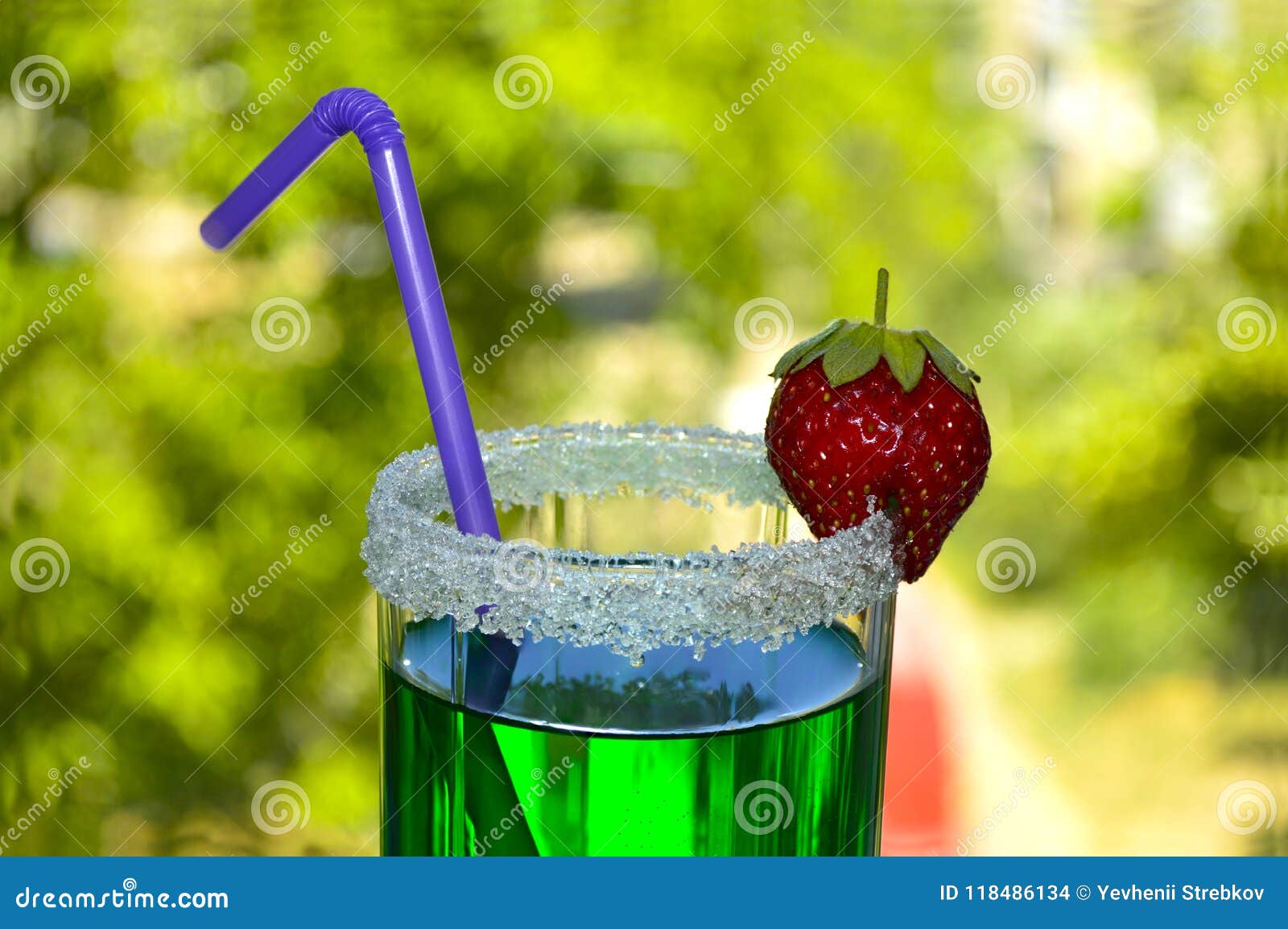 Cocktail Bright Green with Strawberries and Straw Stock Photo - Image ...