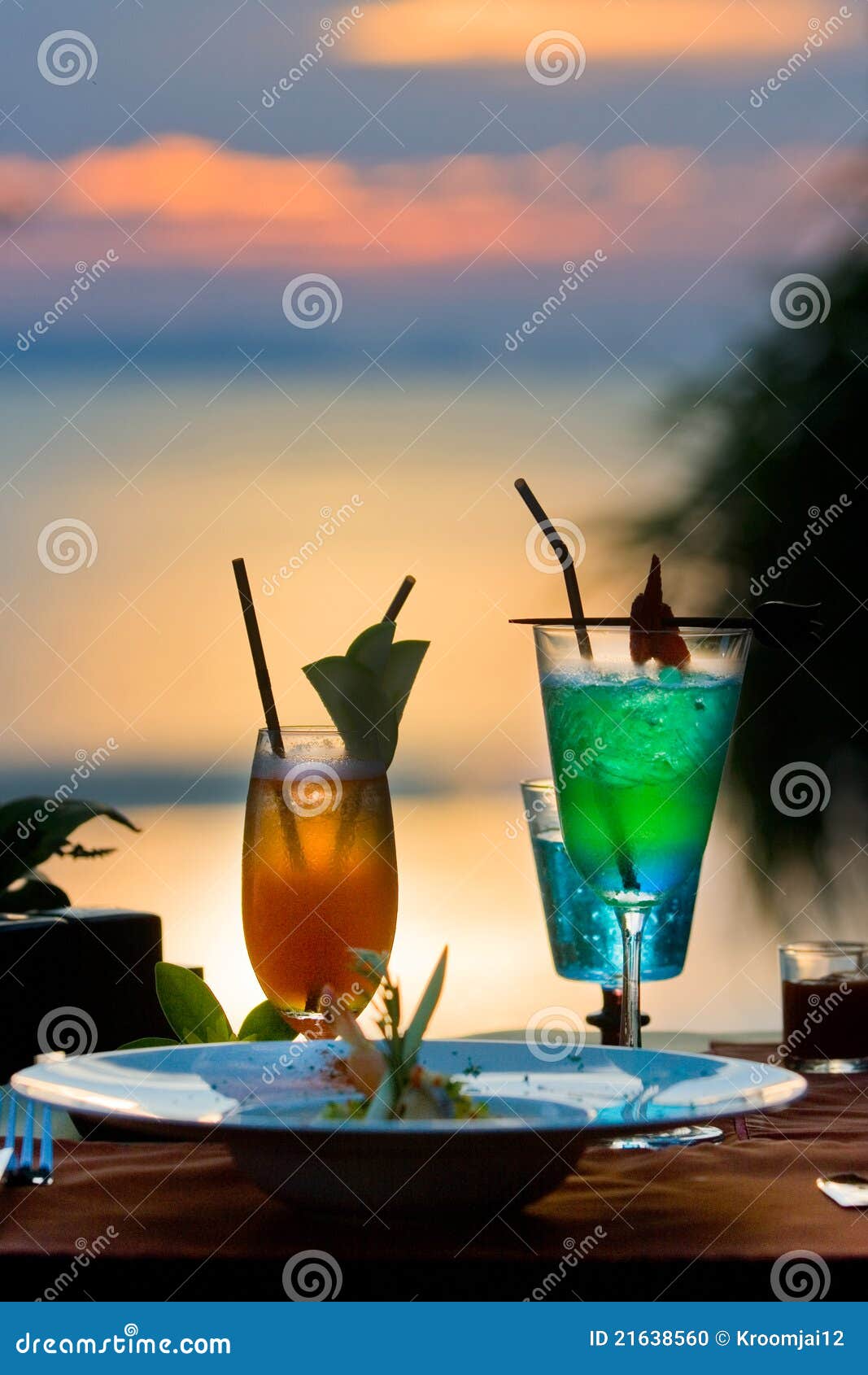 Cocktail on dining table stock photo. Image of dinnerware - 21638560