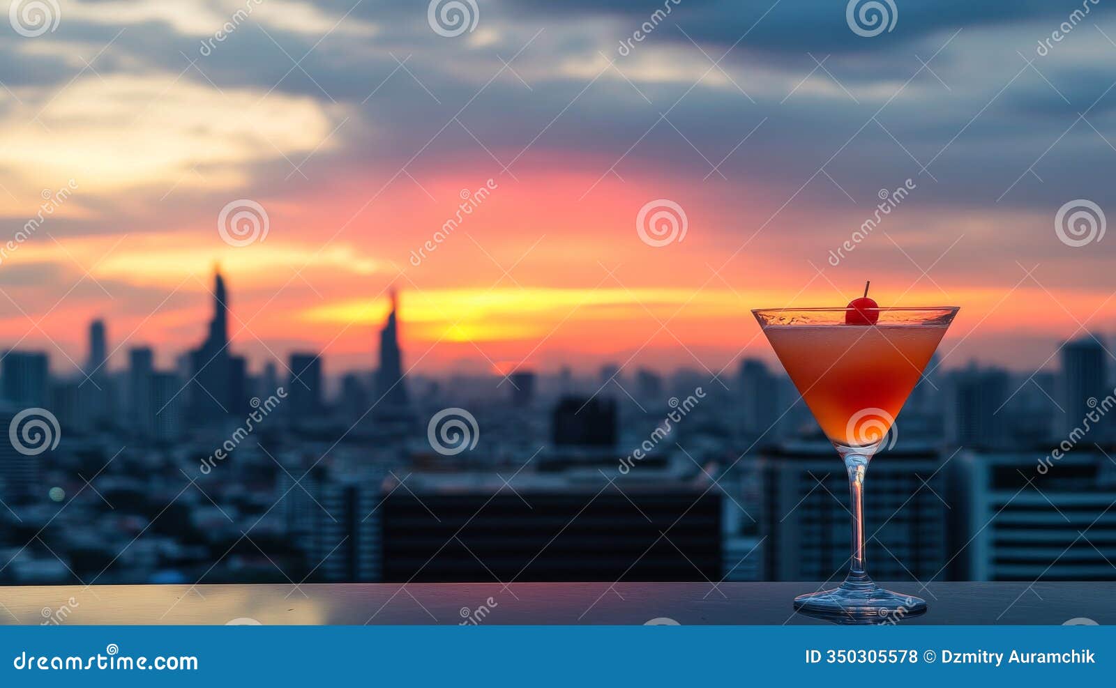 Cocktail at Dusk on a Rooftop Bar, with the City Skyline As the ...