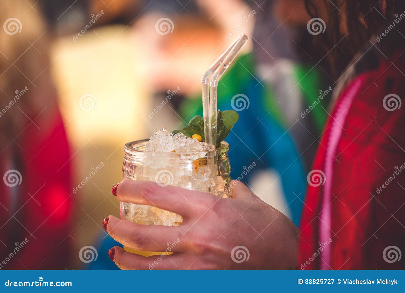 Cocktail in hand stock image. Image of holding, woman - 88825727