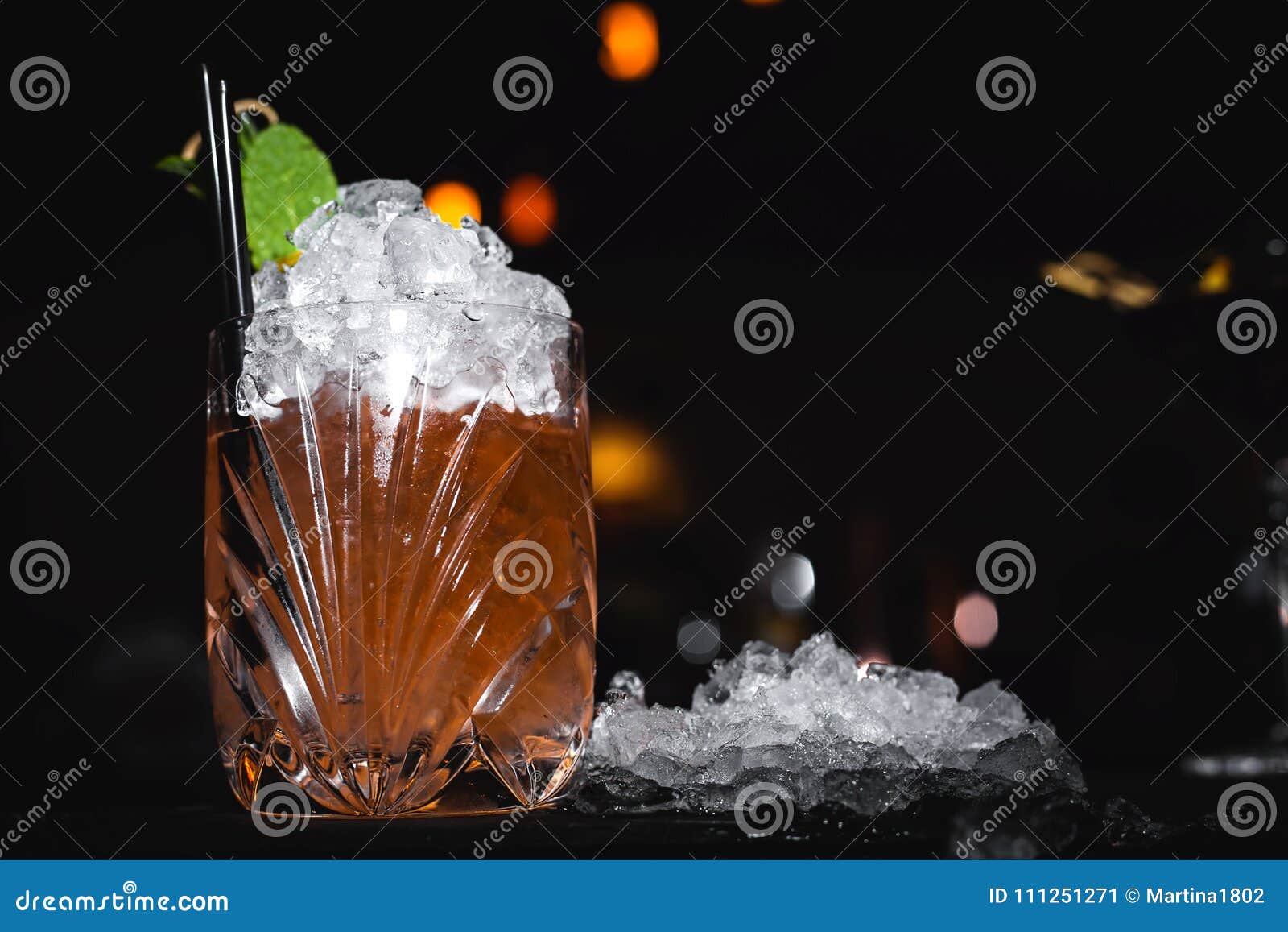 Cocktail with ice crash stock image. Image of club, bourbon - 111251271