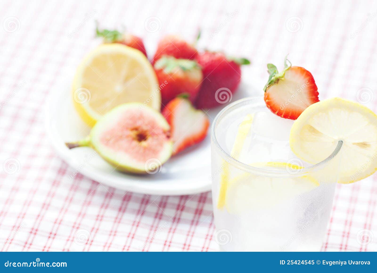 Cocktail with Ice,lemon, Fig and Strawberries Stock Image - Image of ...