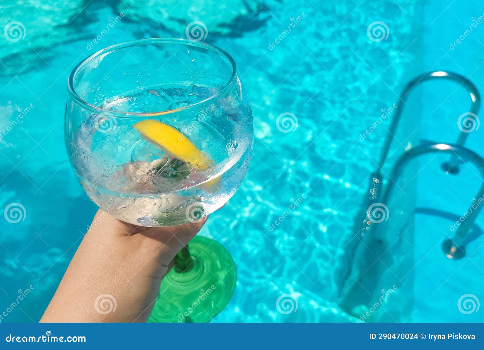 Cocktail with Lemon Tonic on Blue Pool Background Stock Photo - Image ...