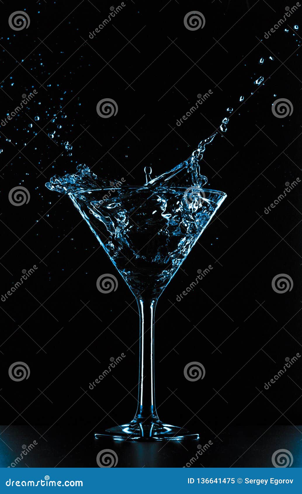 Cocktail Martini Glass Splash on Black Background Stock Image - Image ...