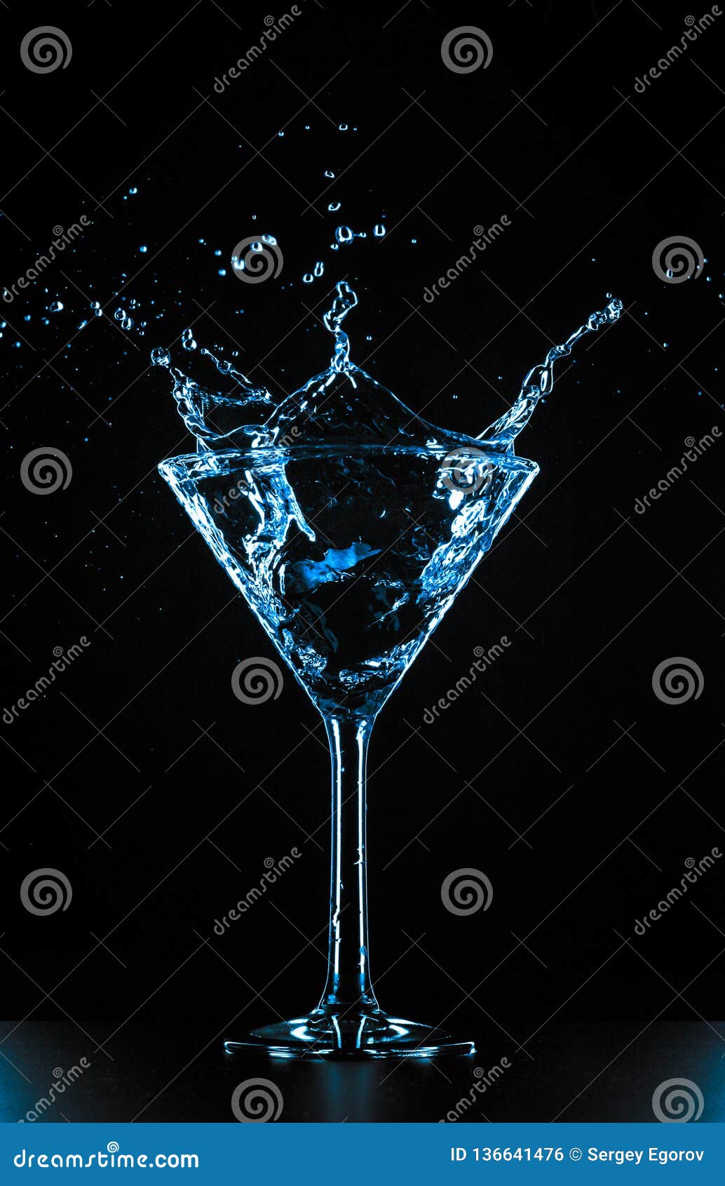 Cocktail Martini Glass Splash On Black Background Stock Photography ...