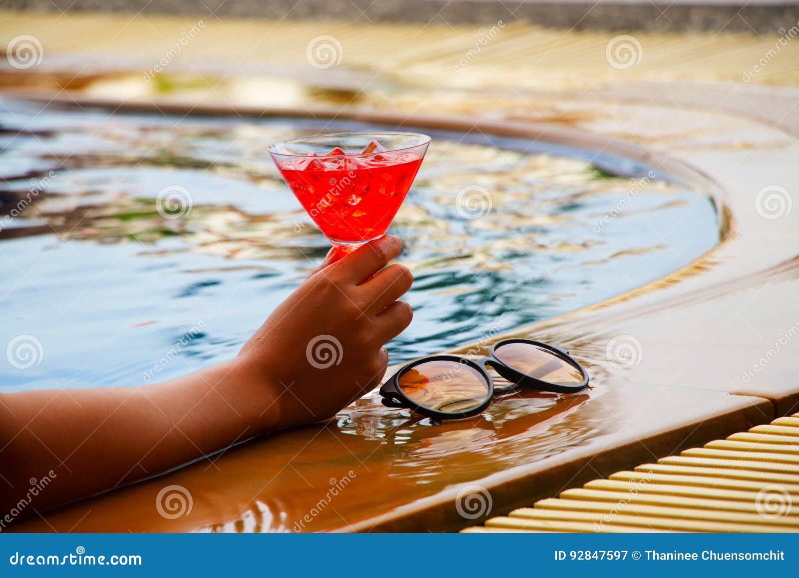 Cocktail by the poolside stock image. Image of beach - 92847597