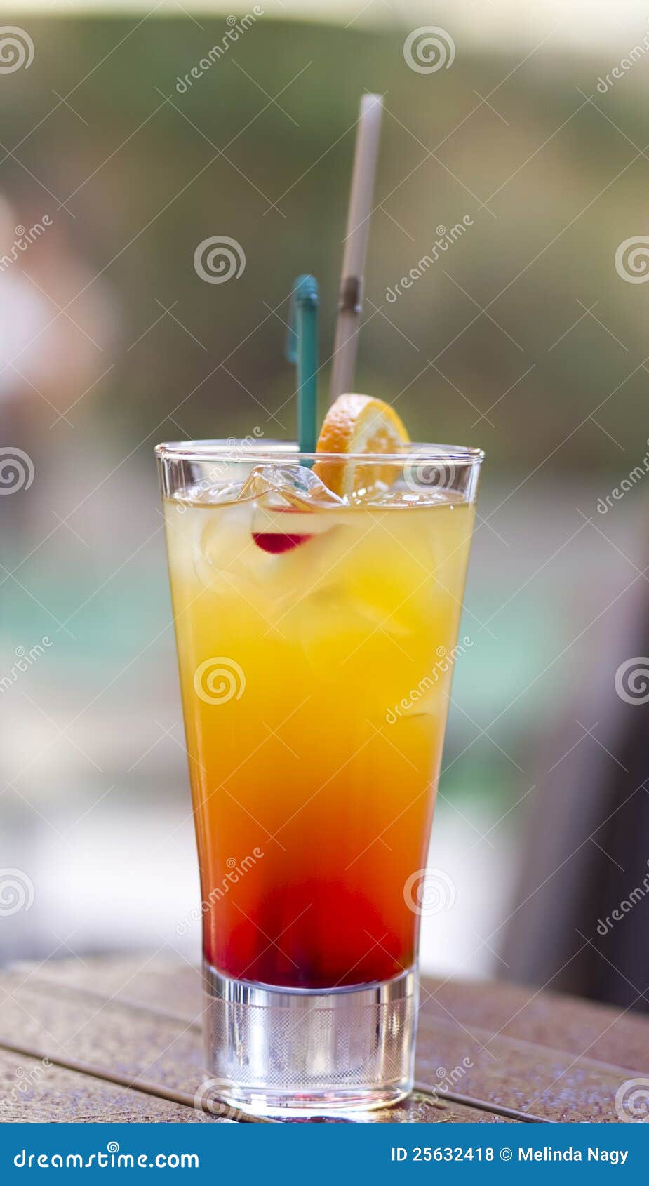 Cocktail on wet table stock photo. Image of refreshment - 25632418