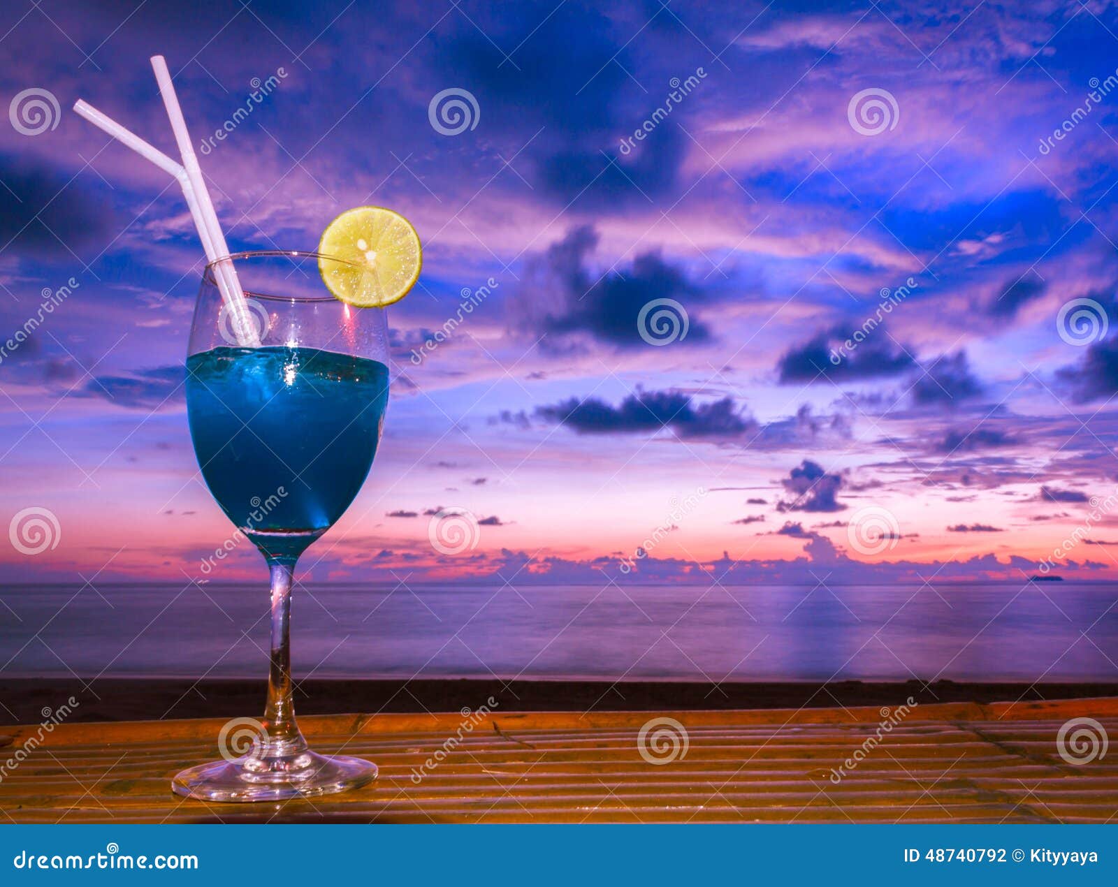 Cocktails at Sunset with Colourful Sky Background Stock Photo - Image ...