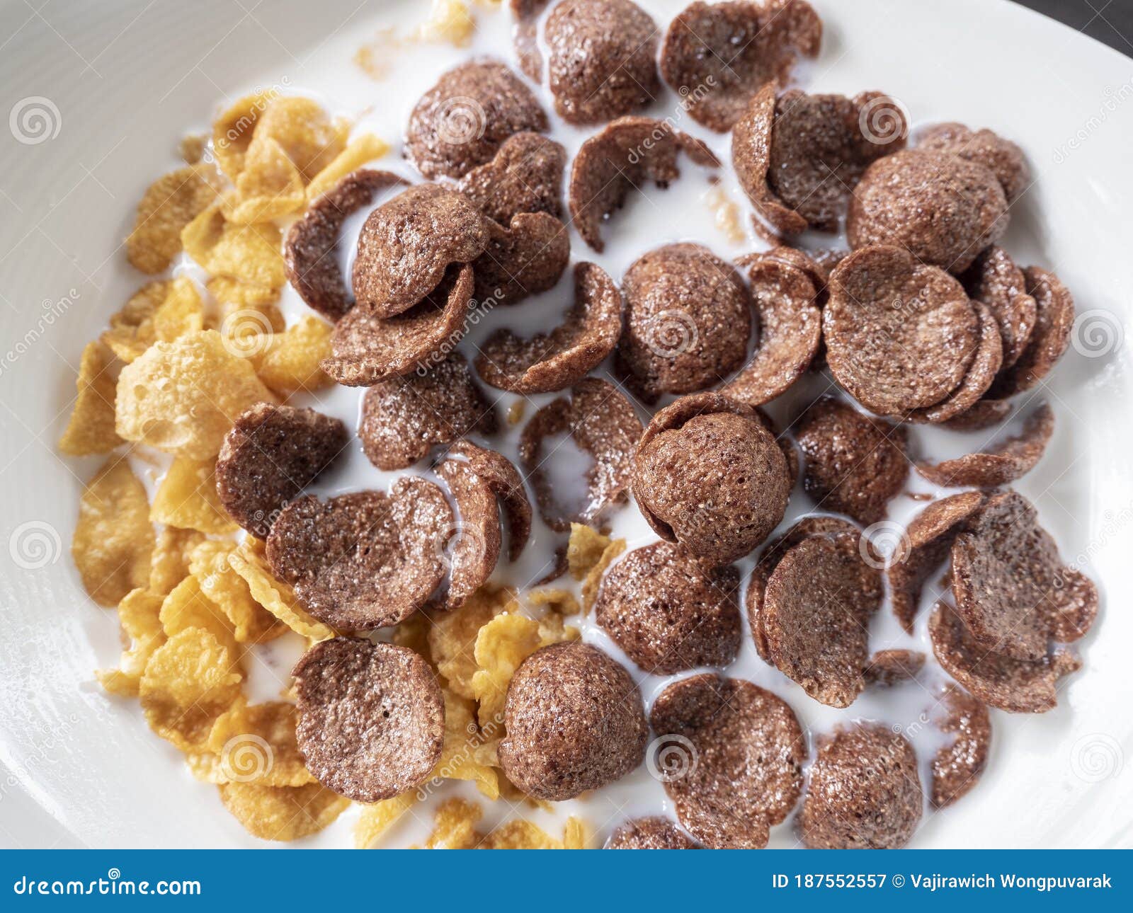 Coco and Corn Flake Mixed in a Milk Bowl. Combination Concepts Stock ...
