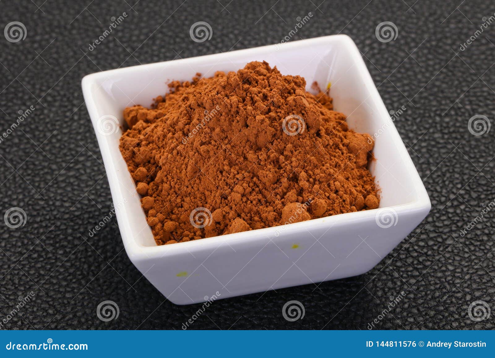 Cocoa powder in the bowl stock photo. Image of aroma - 144811576