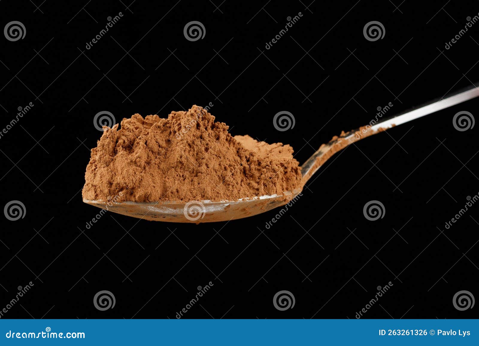 Cocoa Powder on a Spoon on Black Close-up Stock Photo - Image of powder ...