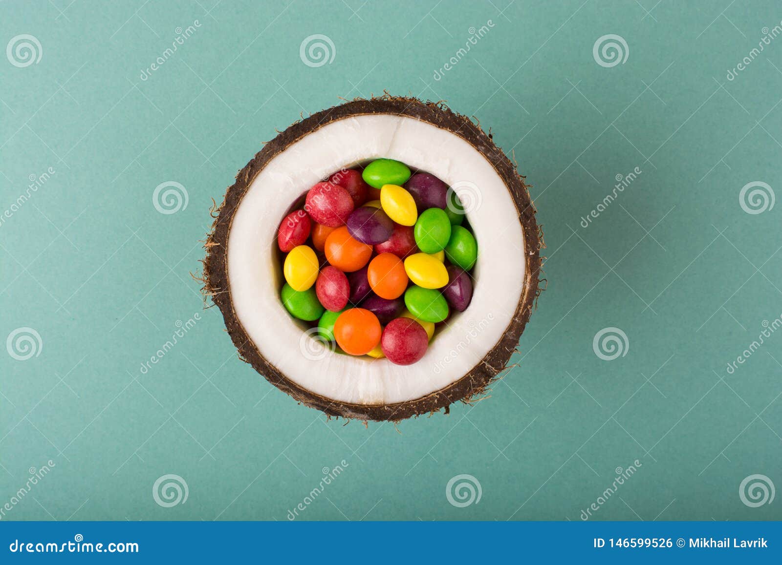 Coconut with Colorful Candies. Stock Photo - Image of creative ...