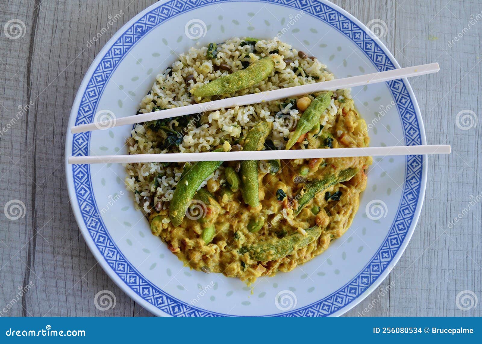 Coconut Curry with Brown Rice and Vegetables Stock Photo - Image of ...