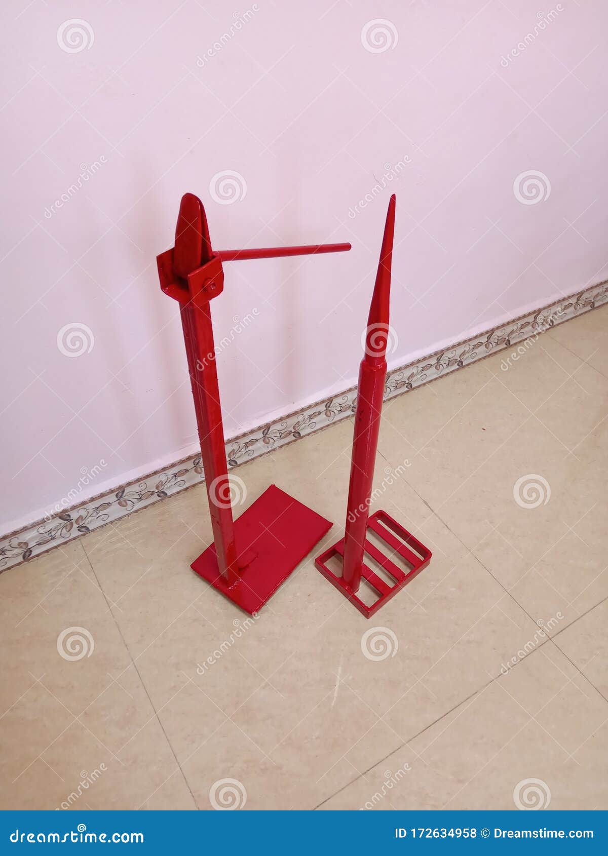 Coconut Husk Peeler Red Color on a Floor Stock Photo - Image of color ...