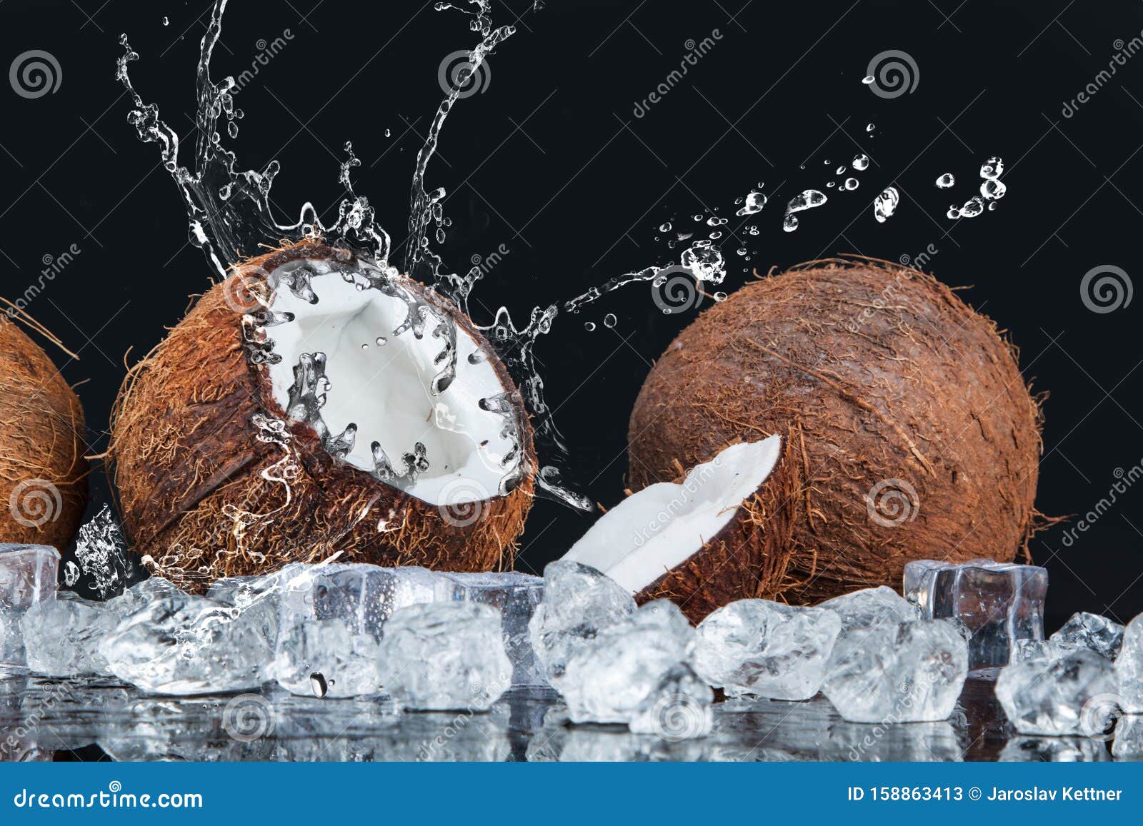 Coconut with ice cubes stock image. Image of ingrediens - 158863413