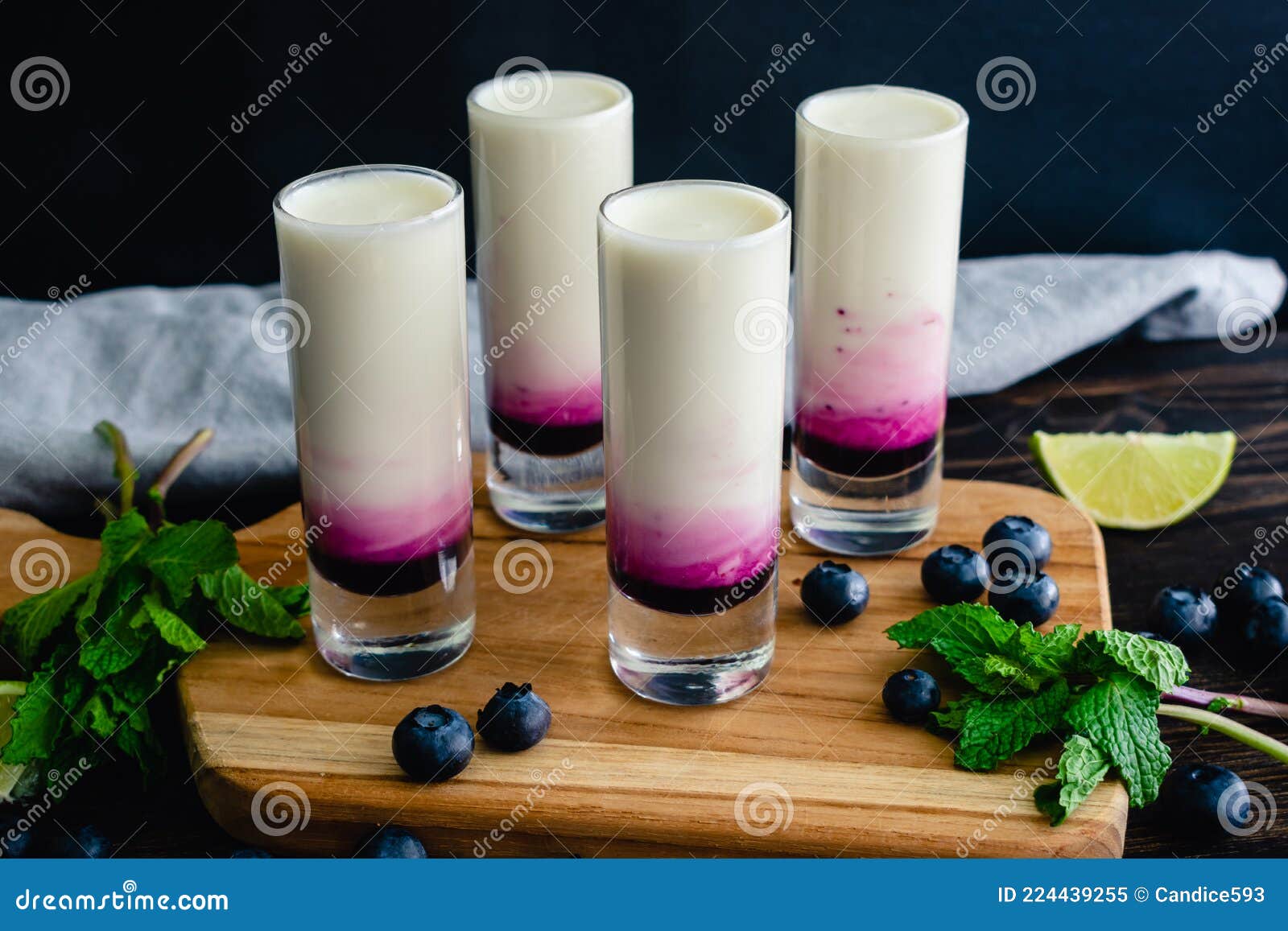 Coconut Lime Mojito Shooters with Blueberry Stock Image - Image of ...