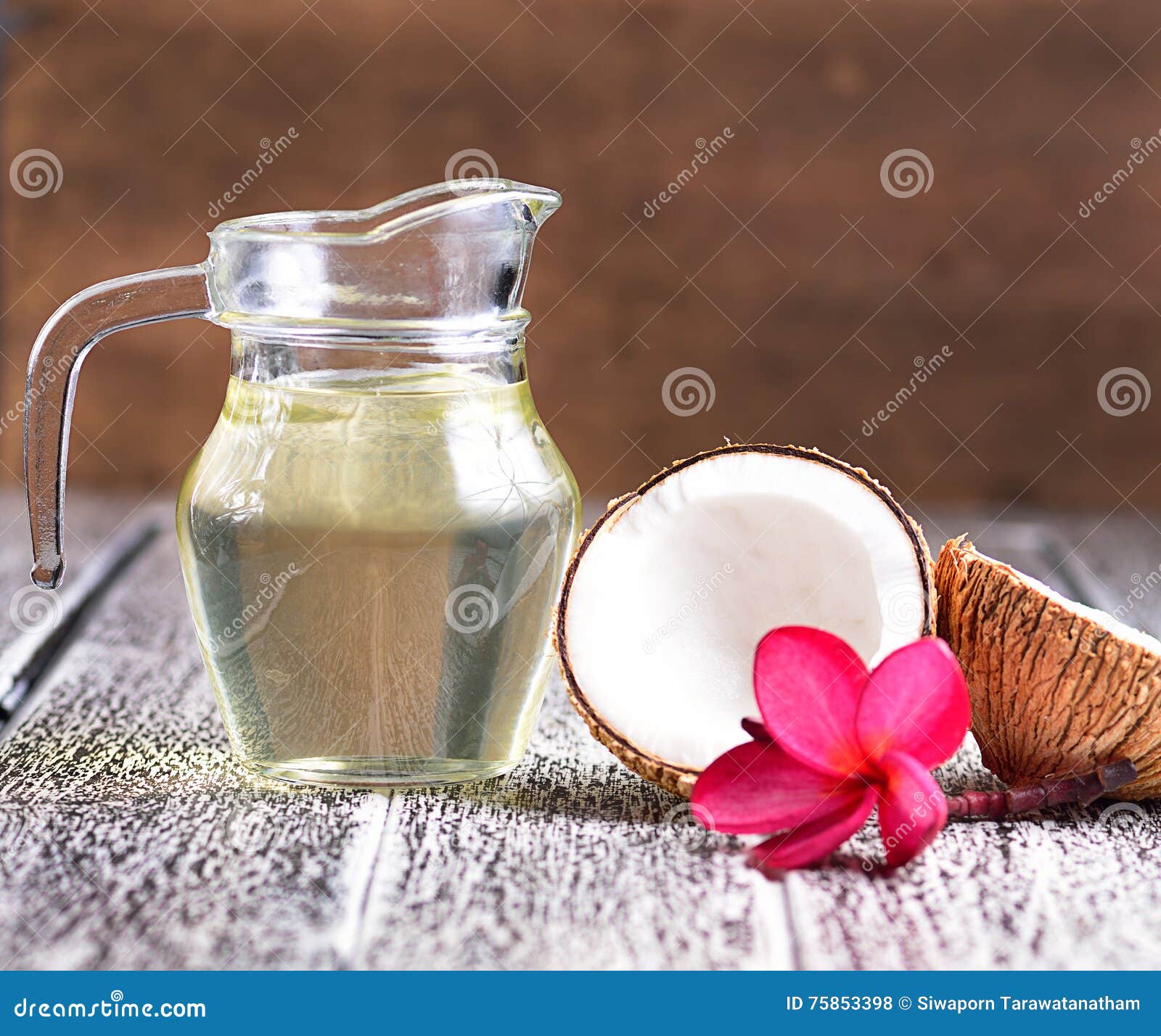Coconut Oil Isolated on Wooden Background. Stock Photo - Image of ...