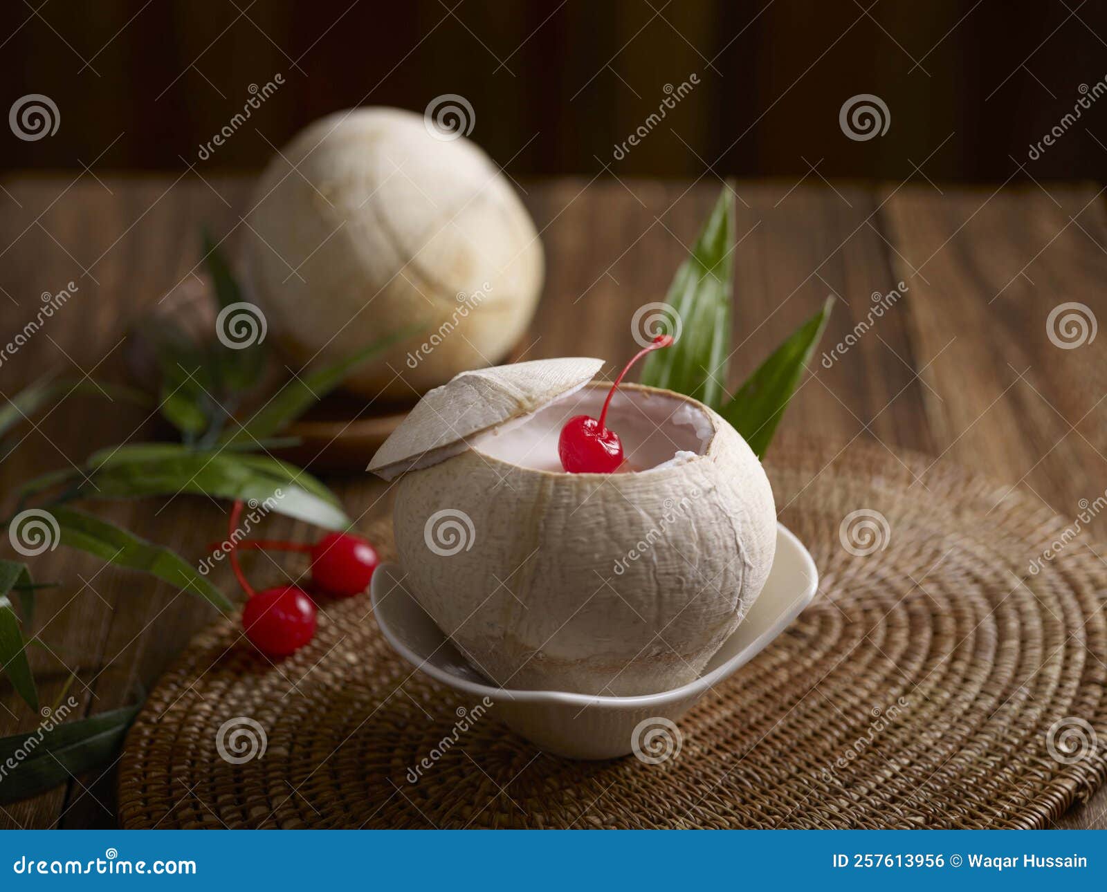 Coconut Pudding with Raspberry Served in a Dish Isolated on Table Side ...
