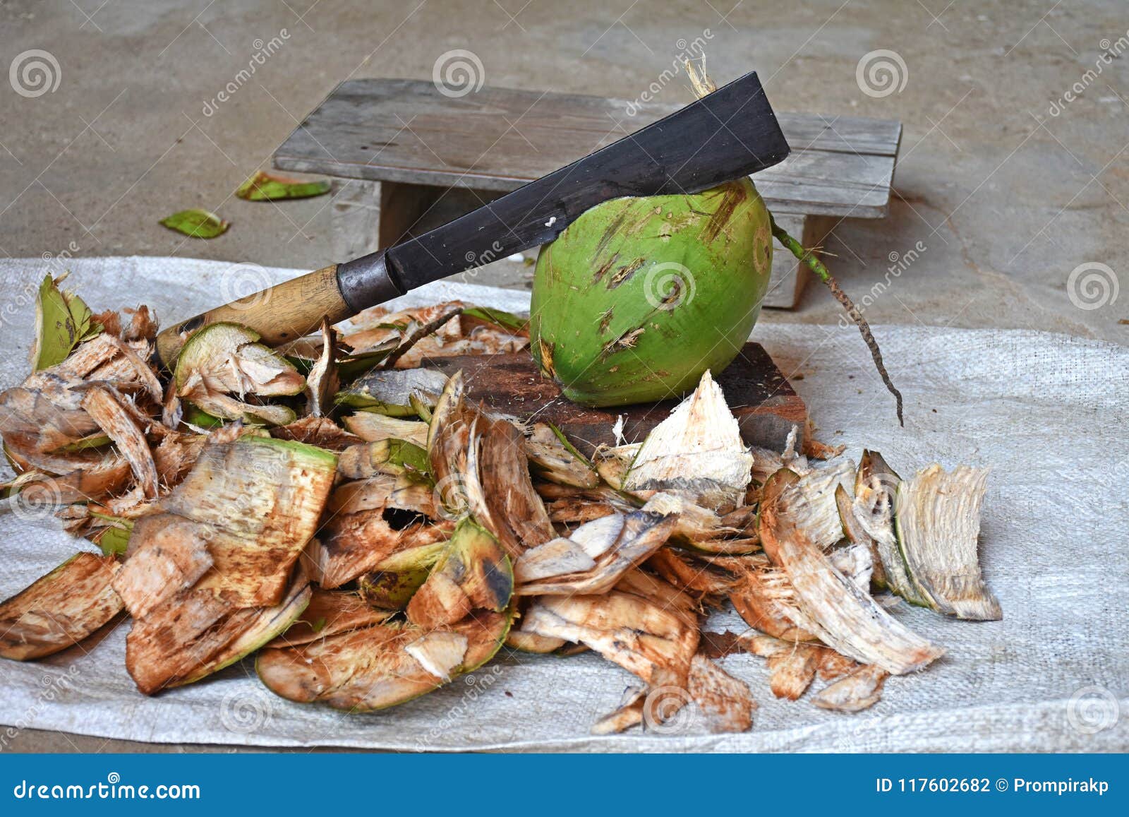 Coconut and Coconut Shell with Chopping Knife and Small Chair on Stock ...