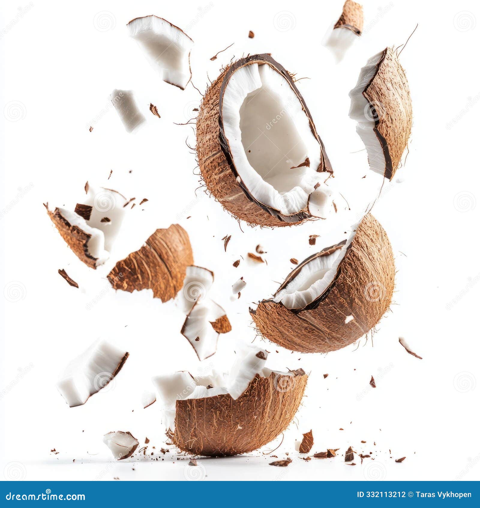 Coconut Shell Fragments Exploding Against a White Background in an ...