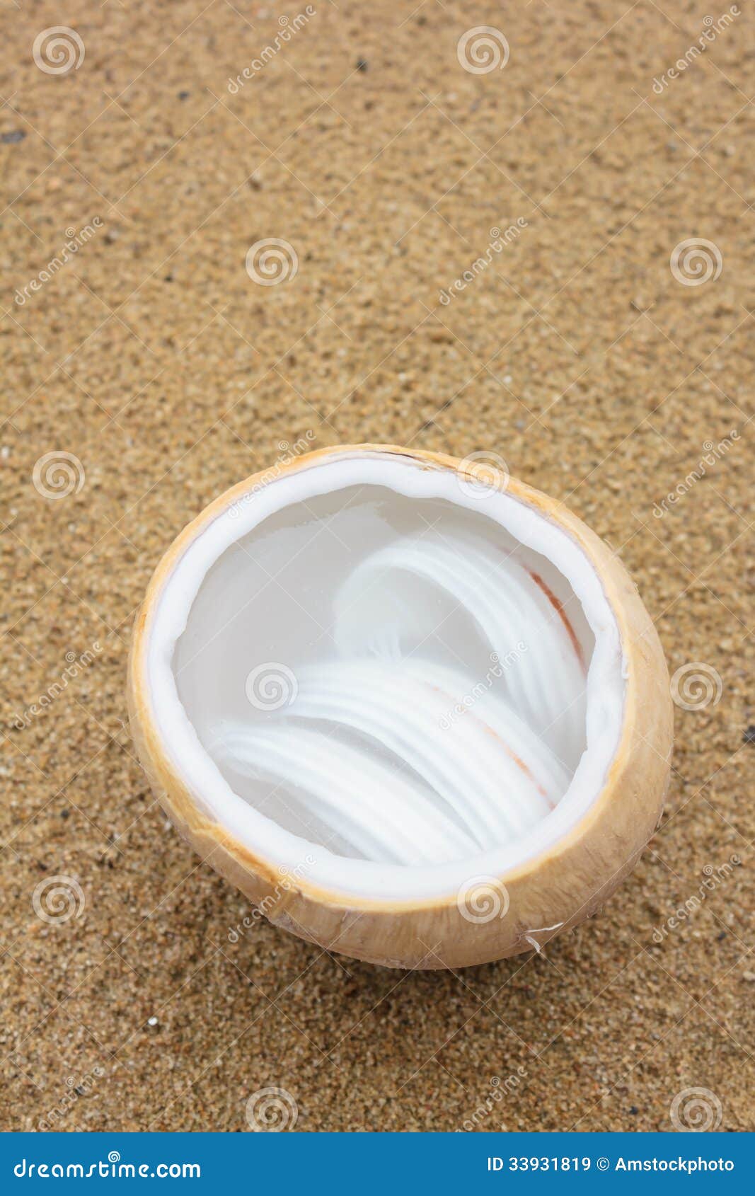 Coconut Water with Coconut Meat in Coconut Shell on Sand Stock Image ...