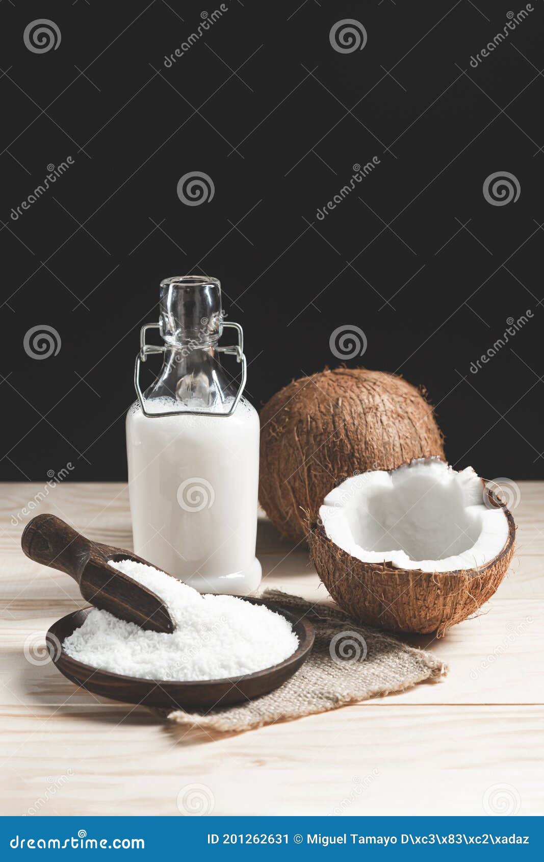 Composition with Coconuts, Coconut Milk and Grated Coconut on Dark ...