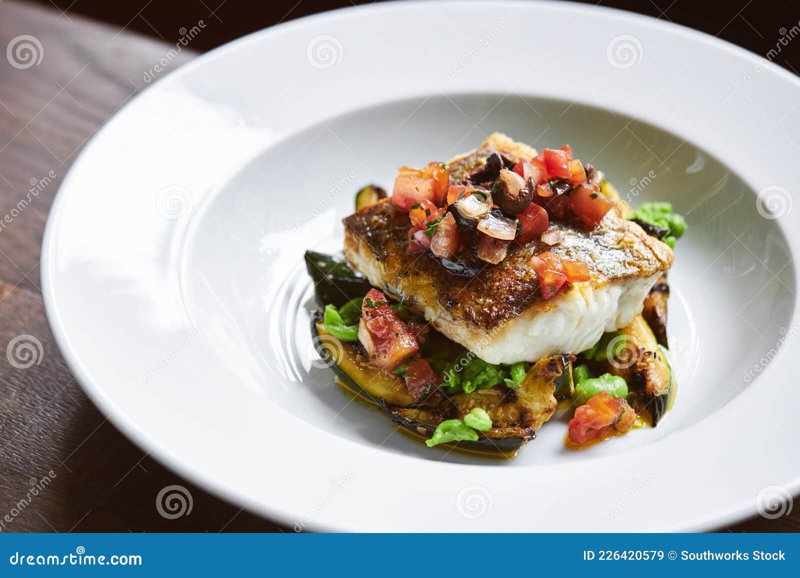 Cod dish on white plate stock image. Image of drink - 226420579