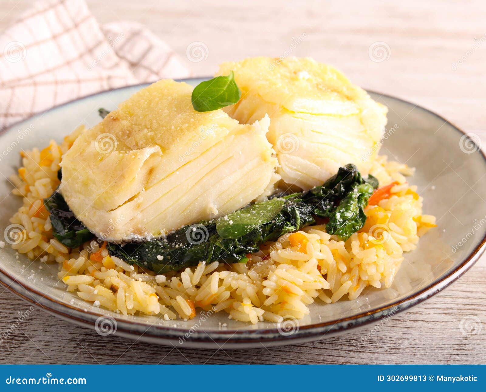 Cod Fillet with Parmesan Topping Over Spinach Stock Image - Image of ...