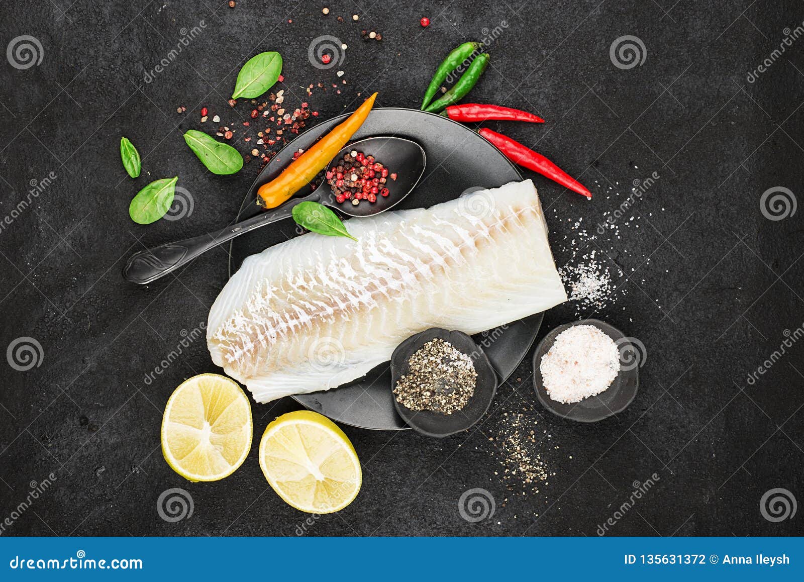 Cod Fillets on a Black Ceramic Plate for the Preparation of a Healthy ...