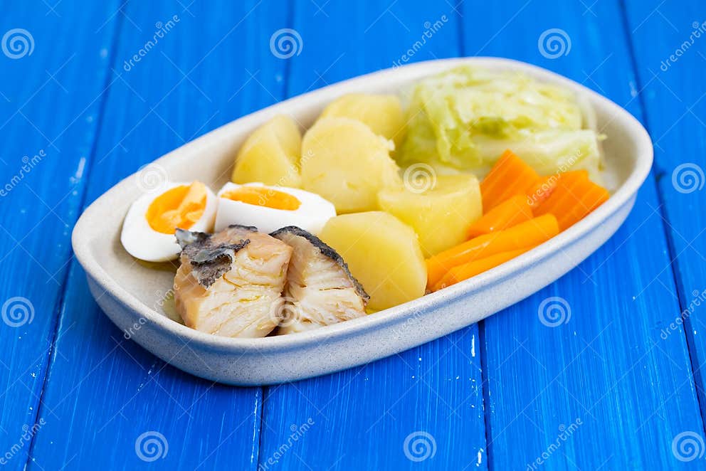 Cod Fish with Boiled Egg and Vegetables on Dish Stock Image - Image of ...