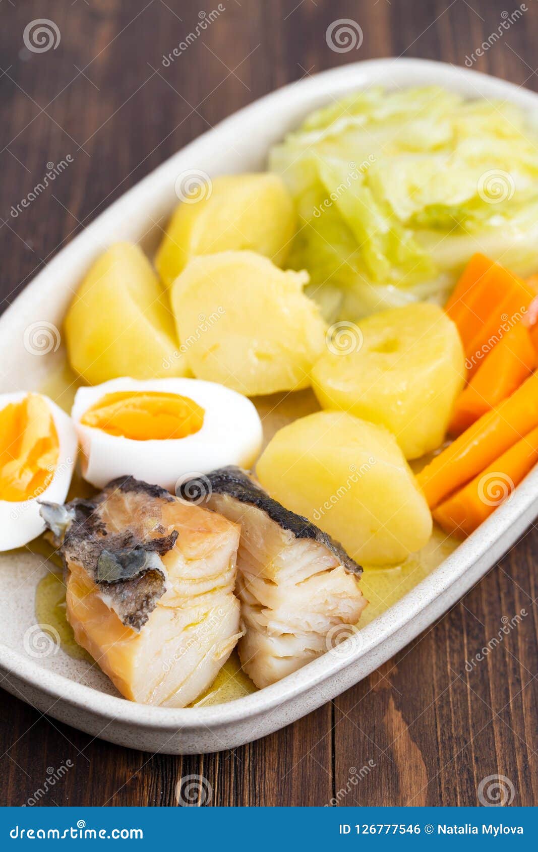Cod Fish with Boiled Egg and Vegetables on Dish Stock Photo - Image of ...